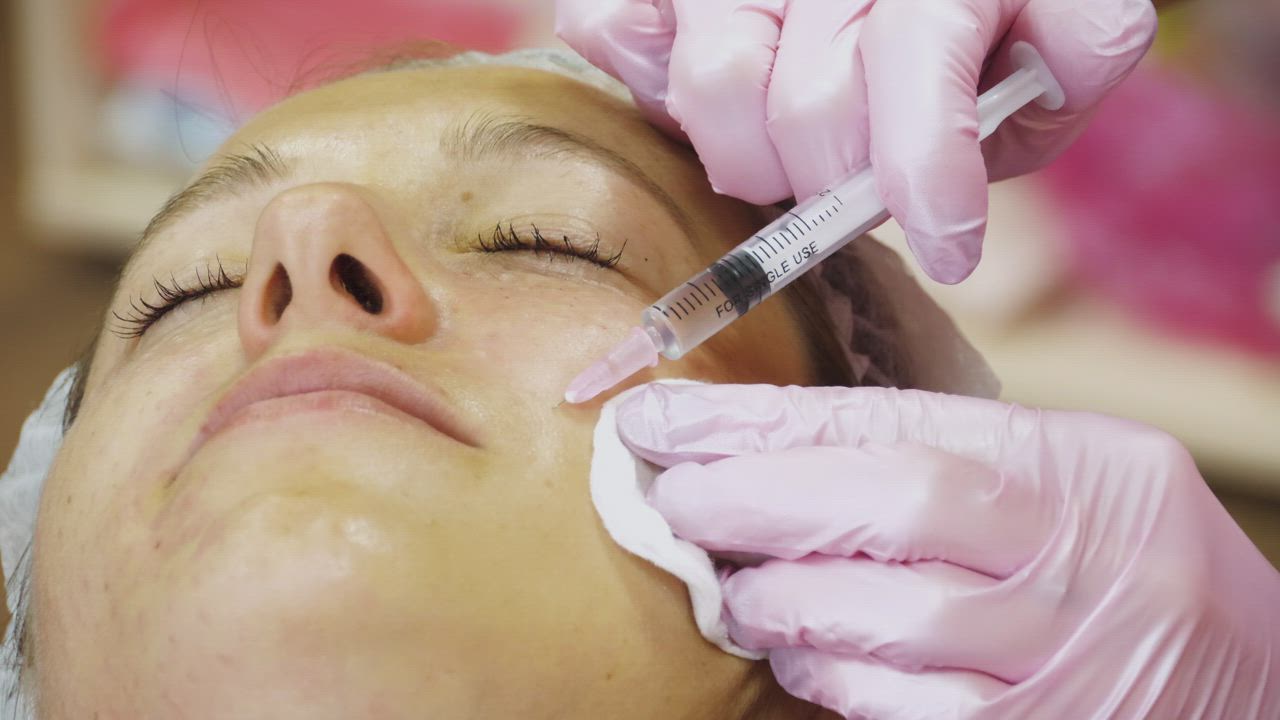 Face lifting injections on woman's face - Free Stock Video