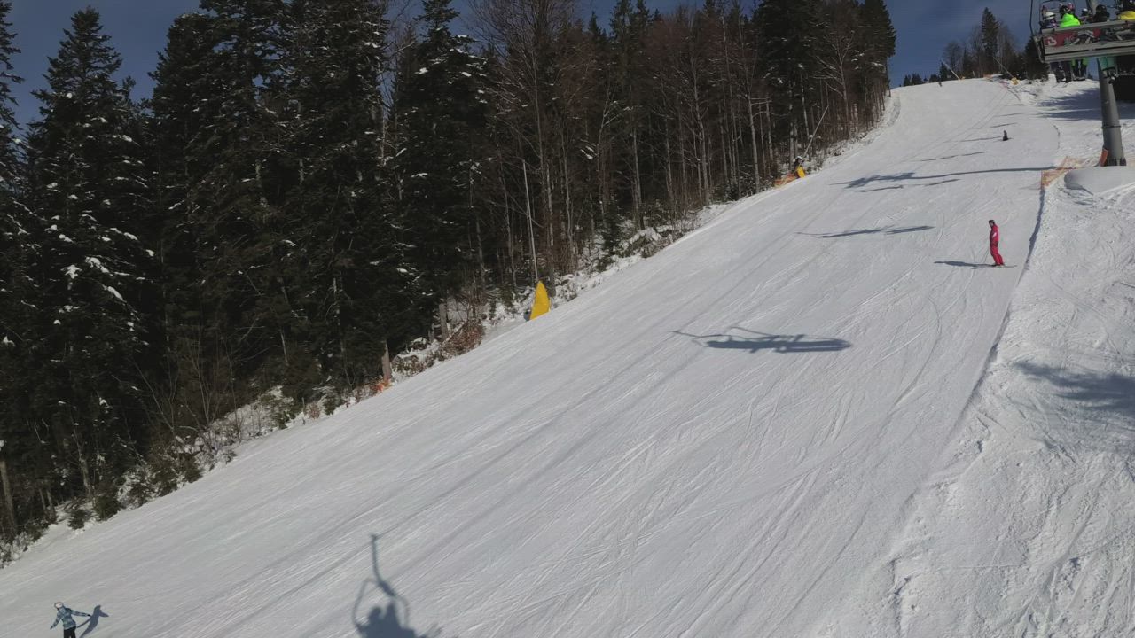 Ski lift shadows in the mountain track - Free Stock Video