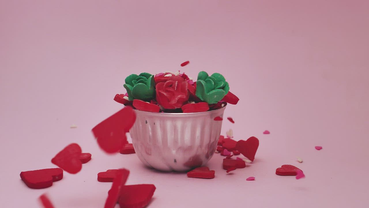 Hearts and roses of candy in flower pot - Free Stock Video