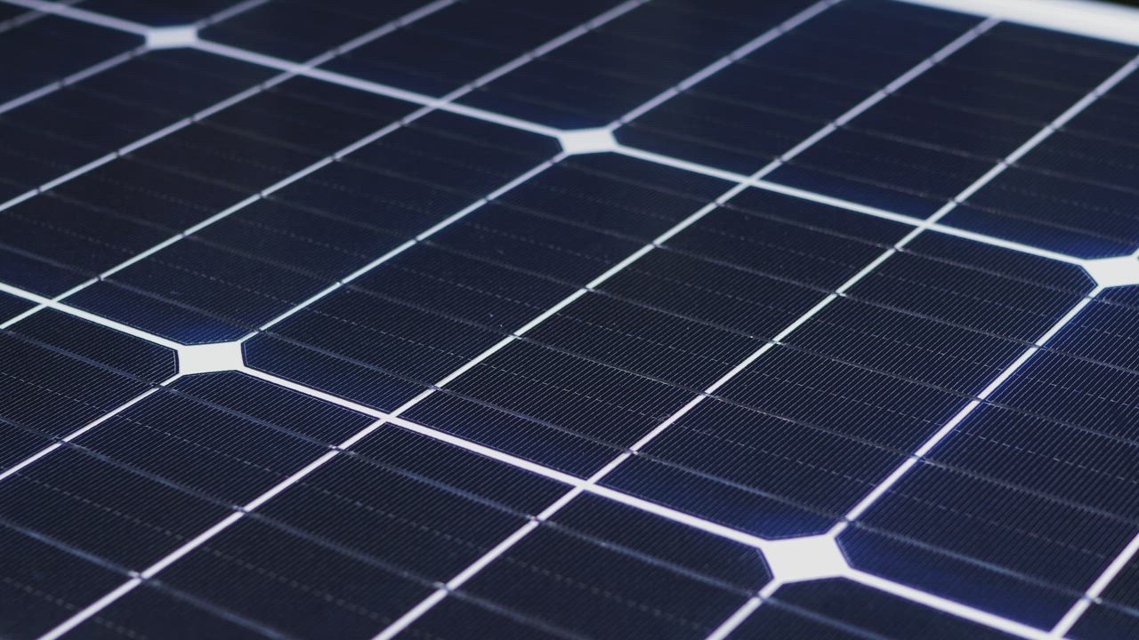 Close up of a solar panel in rotation - Free Stock Video