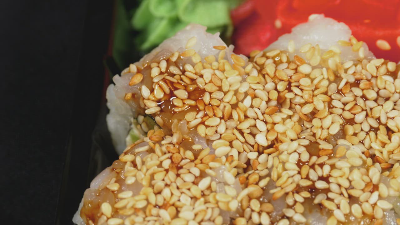 Close up of sushi in rotation - Free Stock Video