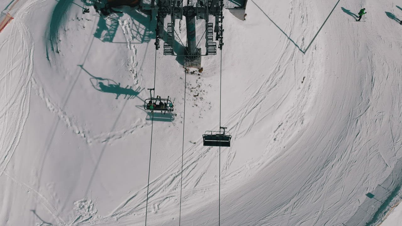 Aerial view of the ski lift mechanism working - Free Stock Video