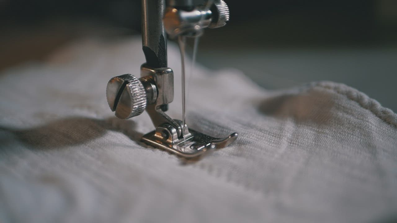 Needle sewing in slow motion - Free Stock Video