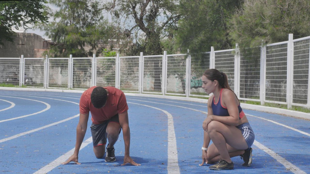Young man runs off while taking his time - Free Stock Video