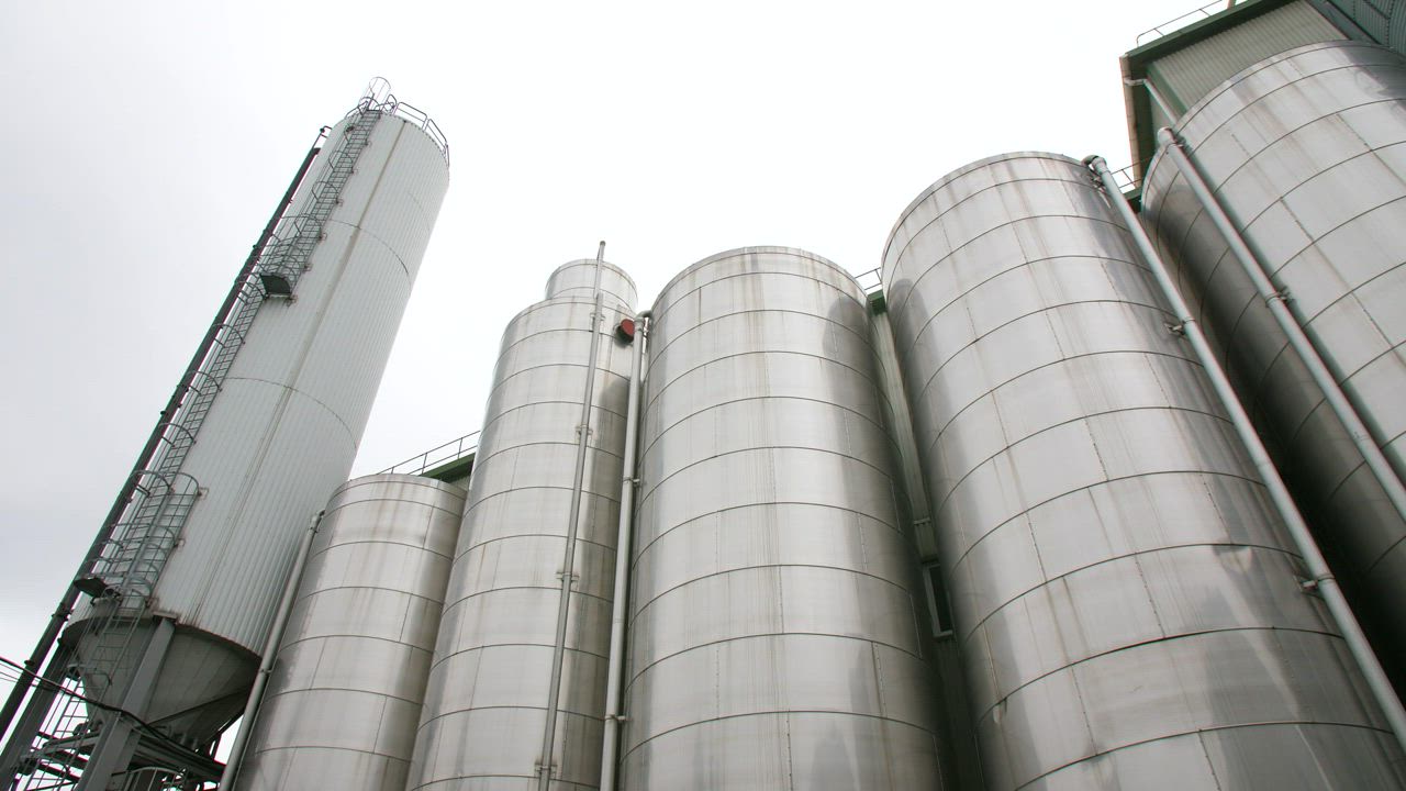 Industrial metal containers of a factory - Free Stock Video