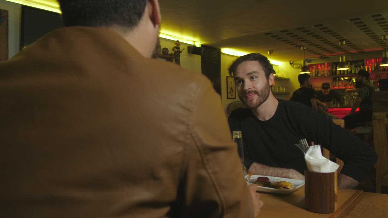 Two men chatting in a restaurant bar - Free Stock Video