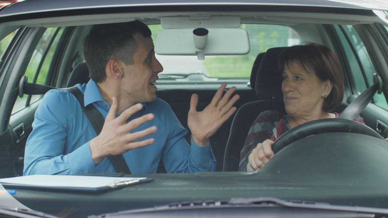 Driving instructor angry at his student - Free Stock Video