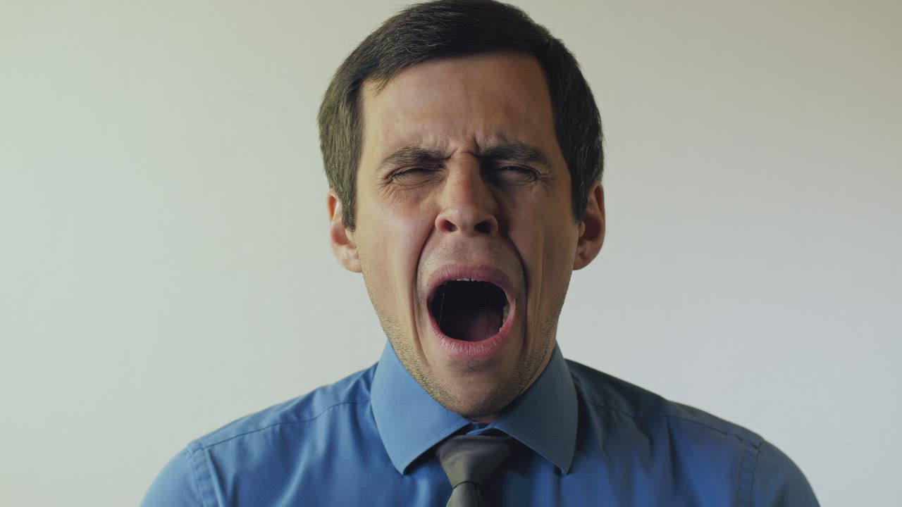 Male office worker yawning, portrait - Free Stock Video