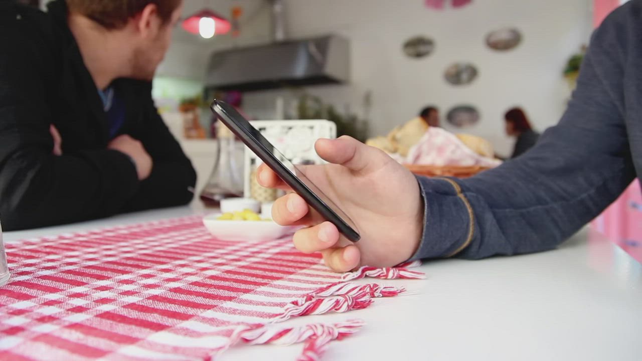 People waiting at the table in a restaurant - Free Stock Video