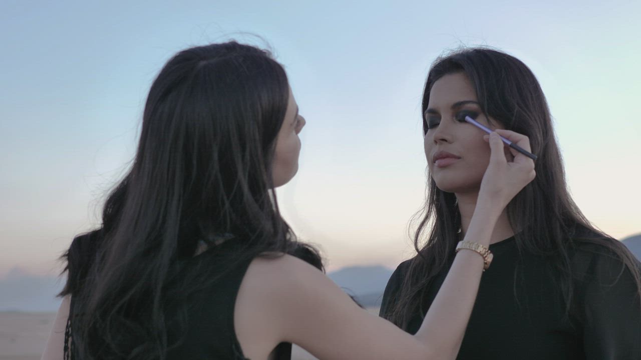 Makeup artist putting makeup on a model - Free Stock Video
