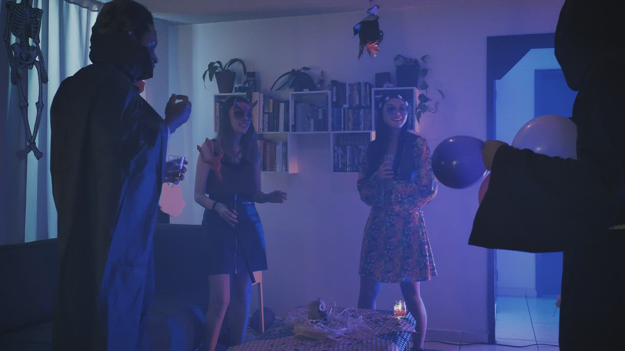 Friends laughing and dancing at a costume party - Free Stock Video