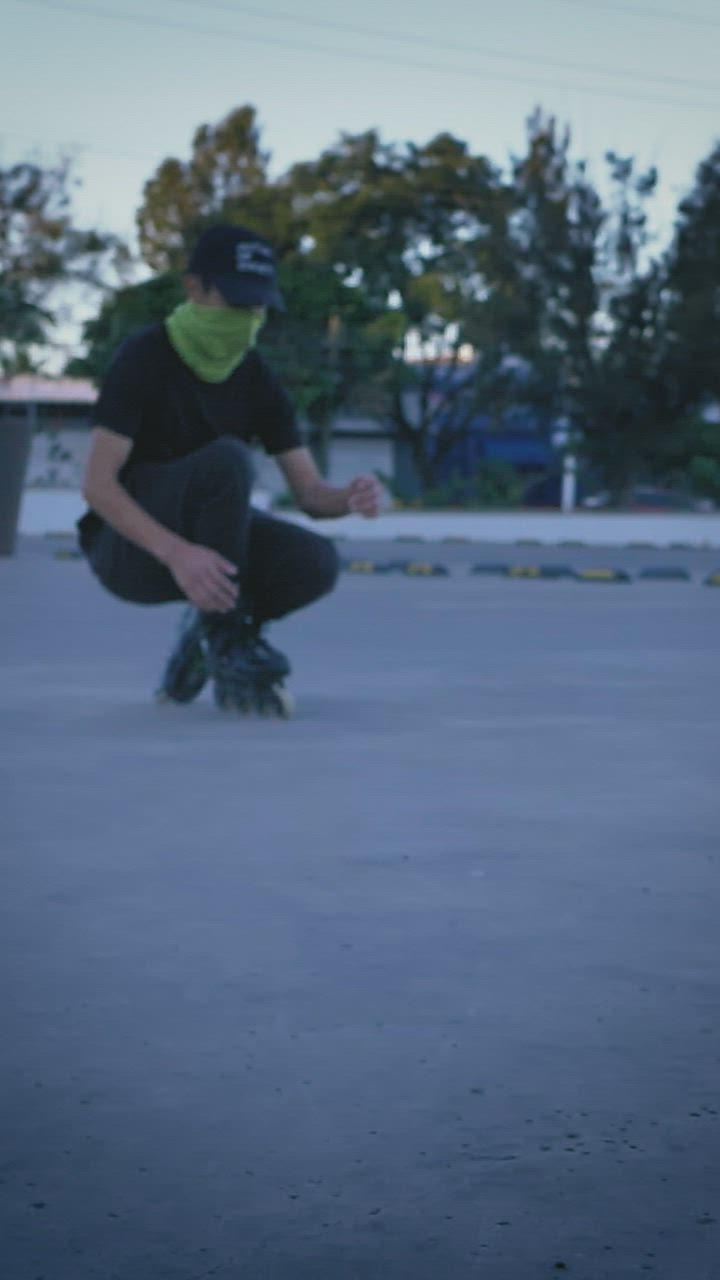 Young man skating in a parking lot - Free Stock Video