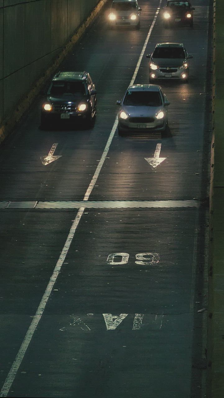 Two avenues with many cars traveling at night - Free Stock Video