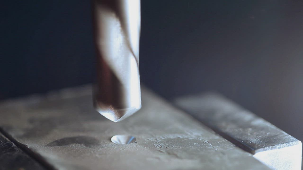 Industrial drill drilling metal - Free Stock Video
