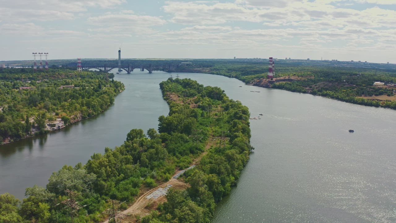 Beautiful landscape of a river near a city - Free Stock Video