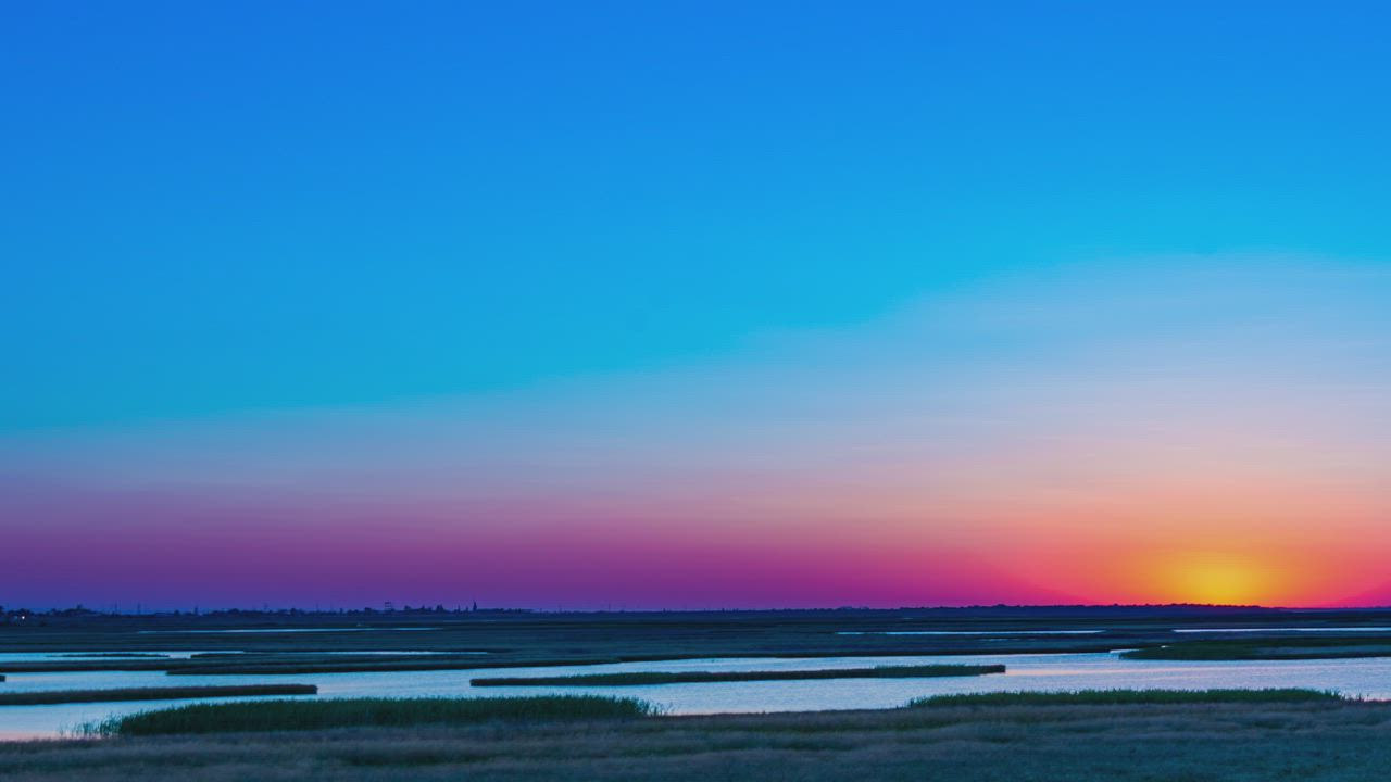 Landscape at sunrise near a river - Free Stock Video