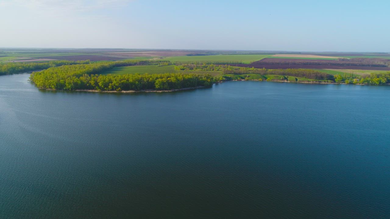 Aerial view of a beautiful blue lake - Free Stock Video