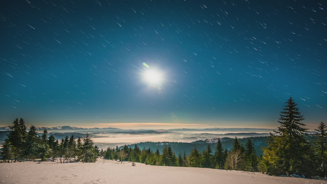 Glowing moon in the starry sky - Free Stock Video