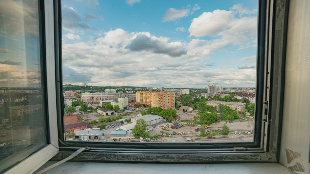 View through a window in a city - Free Stock Video
