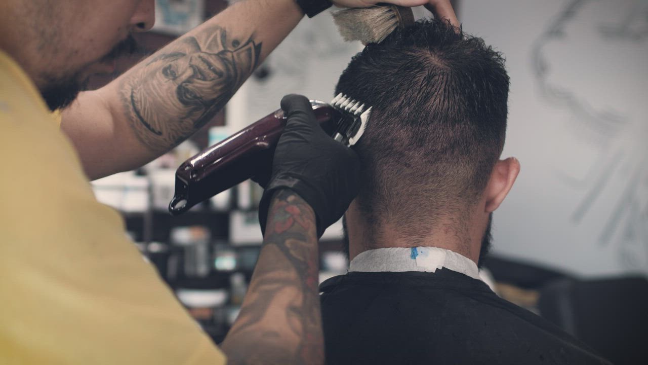 Barber cutting hair - Free Stock Video
