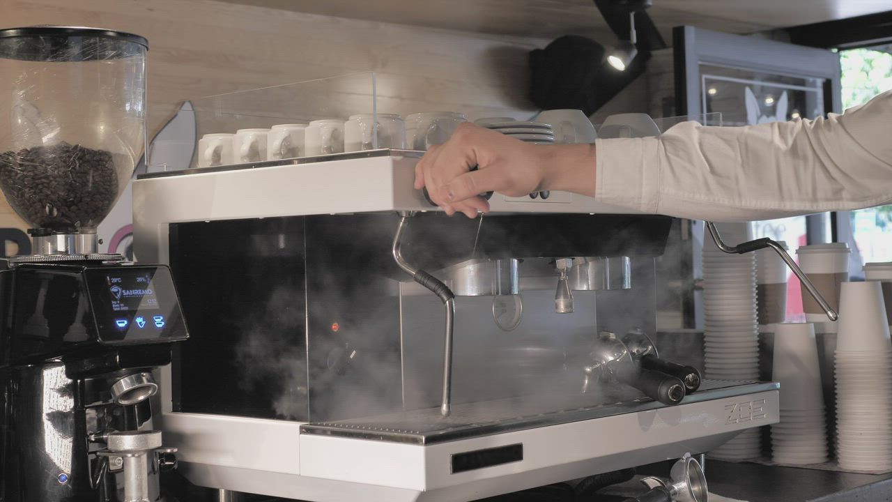 Coffee and steam machine in a coffee shop - Free Stock Video