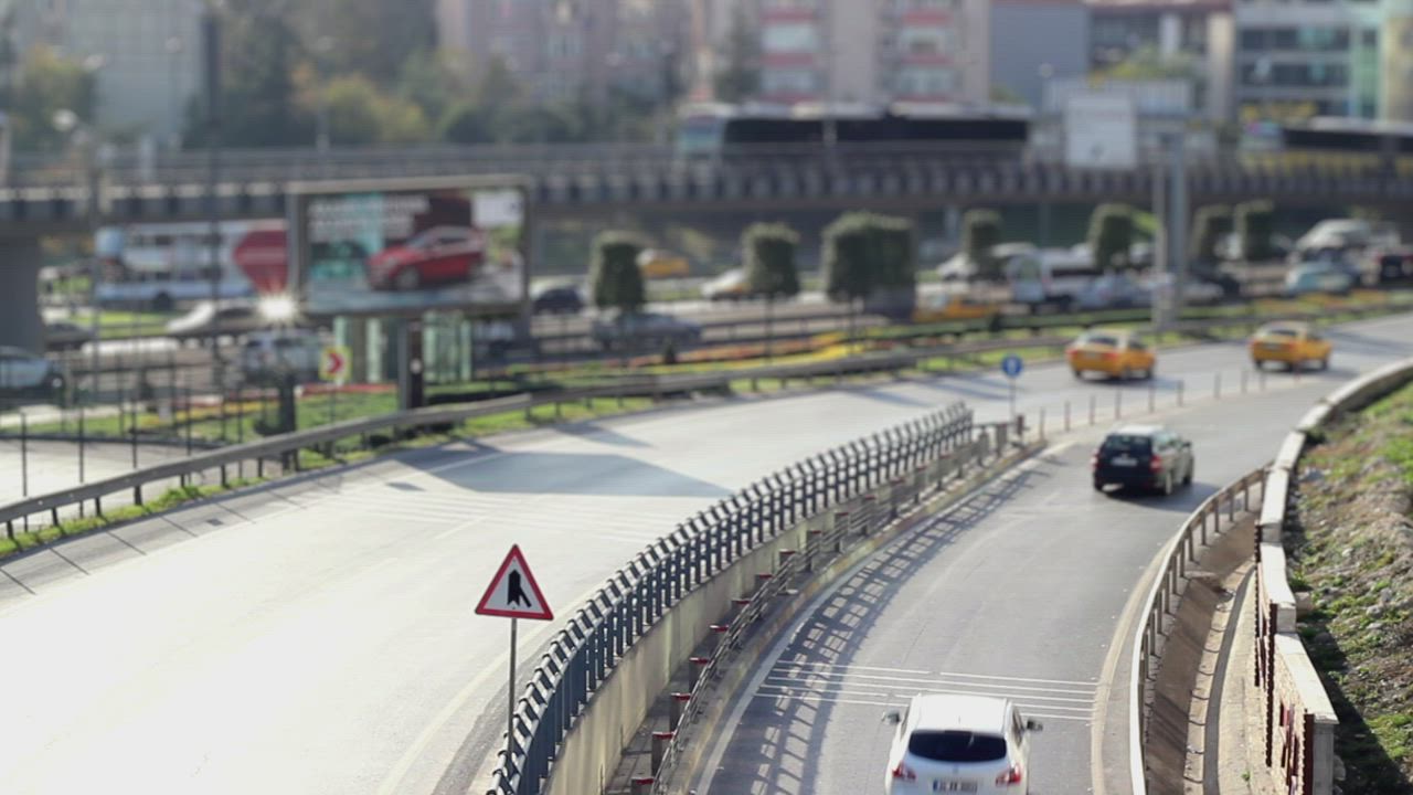 Roads of a city with many cars going fast - Free Stock Video