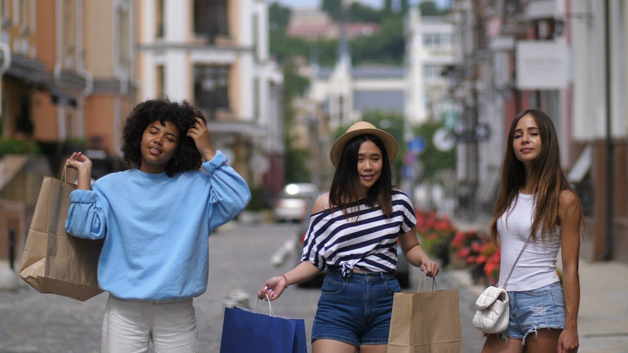 Happy friends partying on a shopping day - Free Stock Video