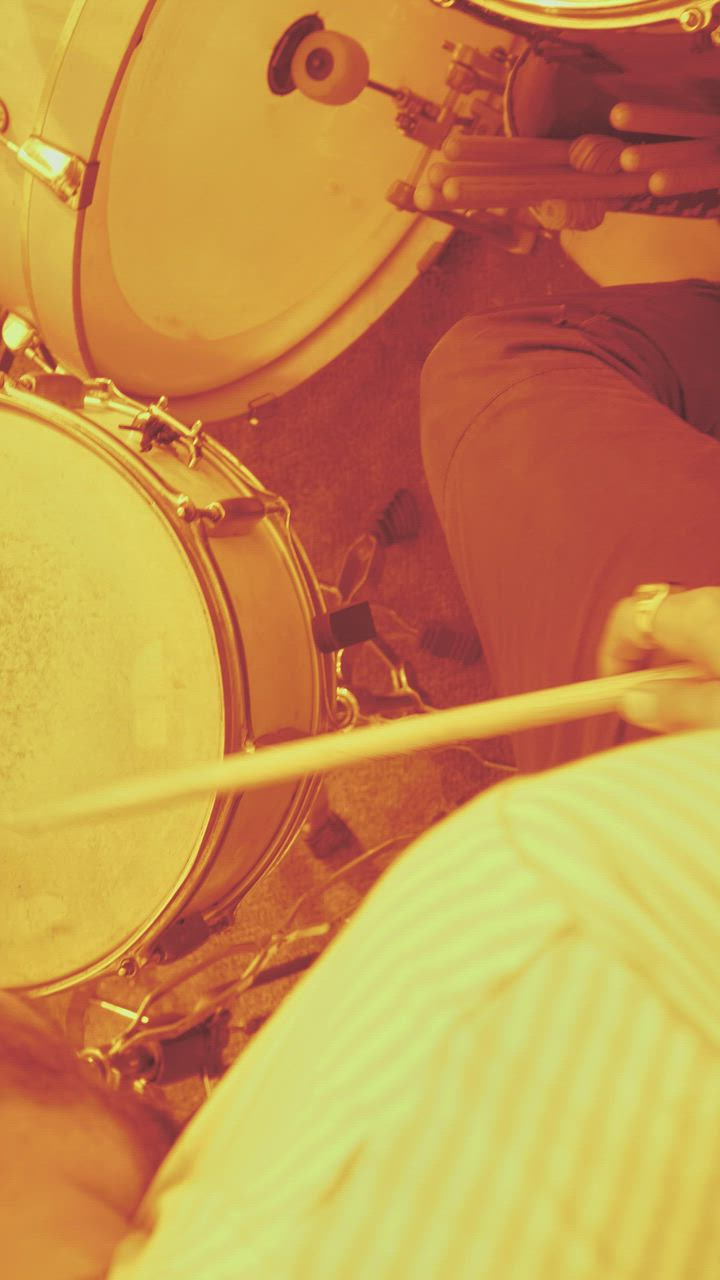 Man playing drums with sepia filter - Free Stock Video