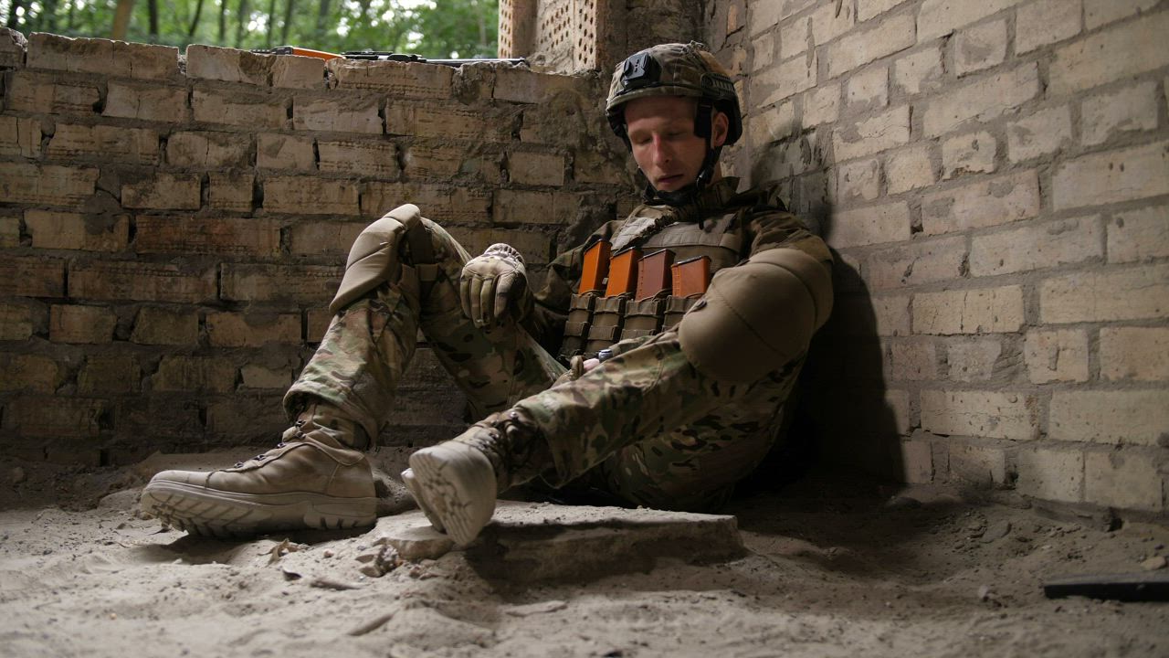 Exhausted soldier after a battle in a war zone - Free Stock Video
