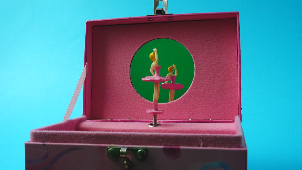 Pink music box with a spinning dancing doll - Free Stock Video