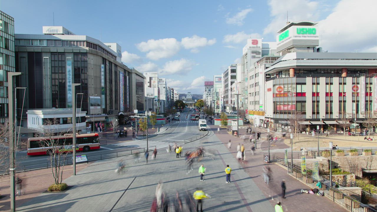 Pedestrian path and streets of a city - Free Stock Video