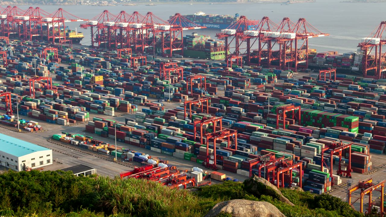 Huge container area on a shoreline, aerial shot - Free Stock Video