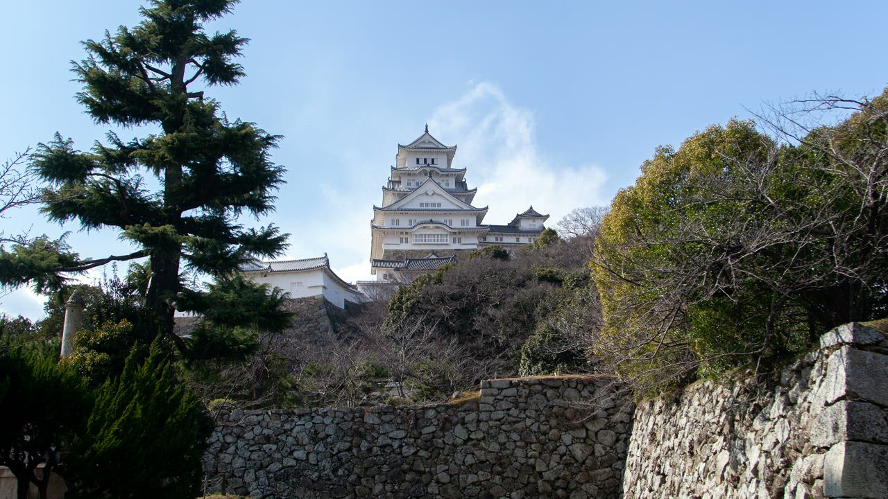 Japanese white building high up seen from below - Free Stock Video