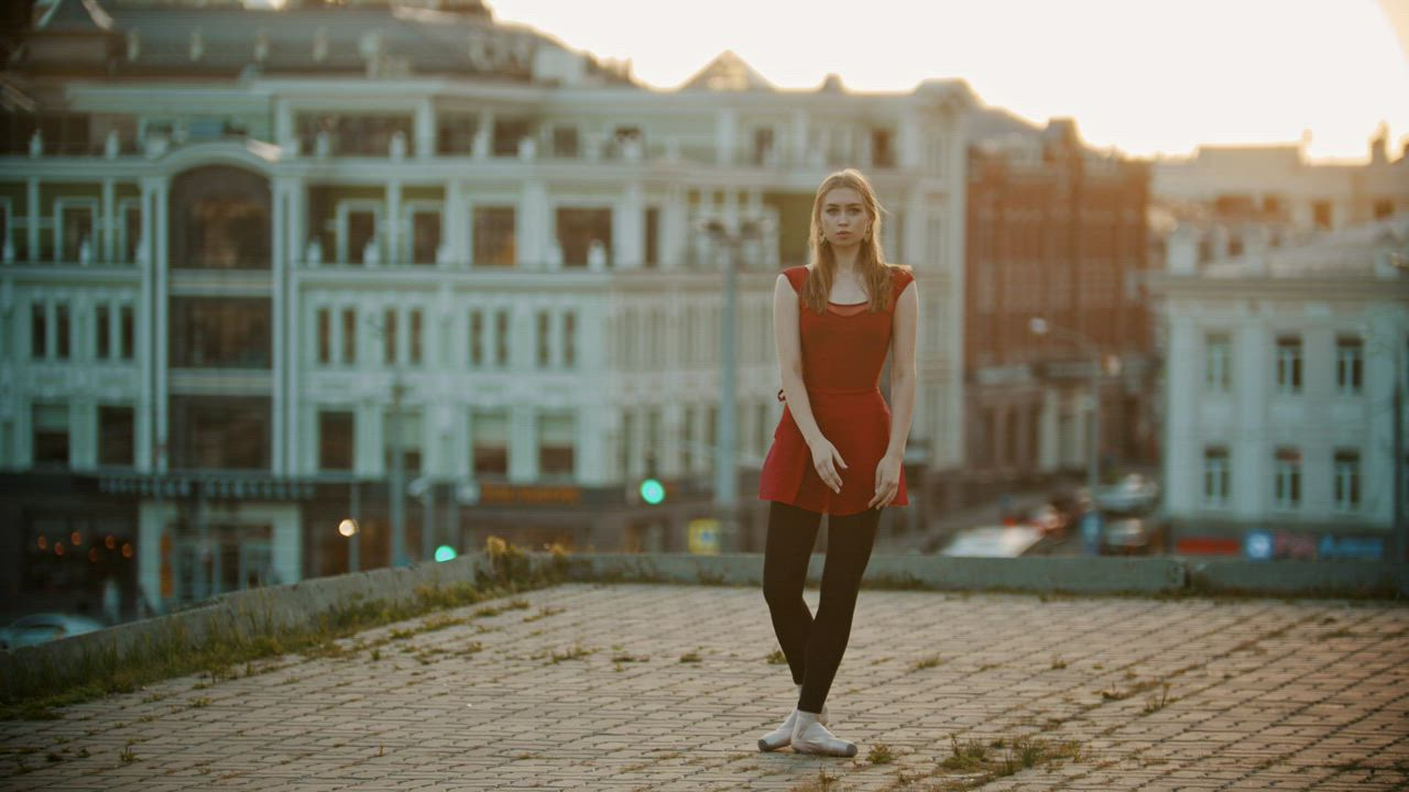 Flexible ballet dancer does a complicated position - Free Stock Video