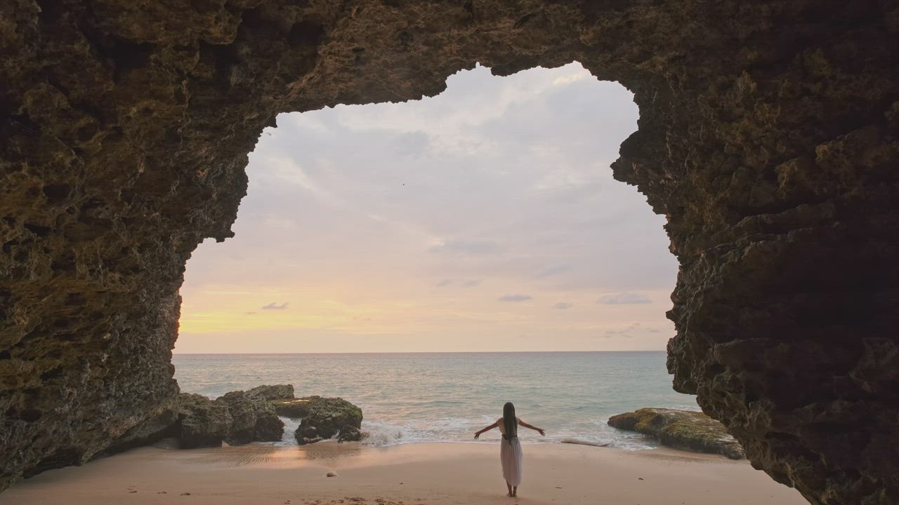 Woman feeling freedom at the beach - Free Stock Video