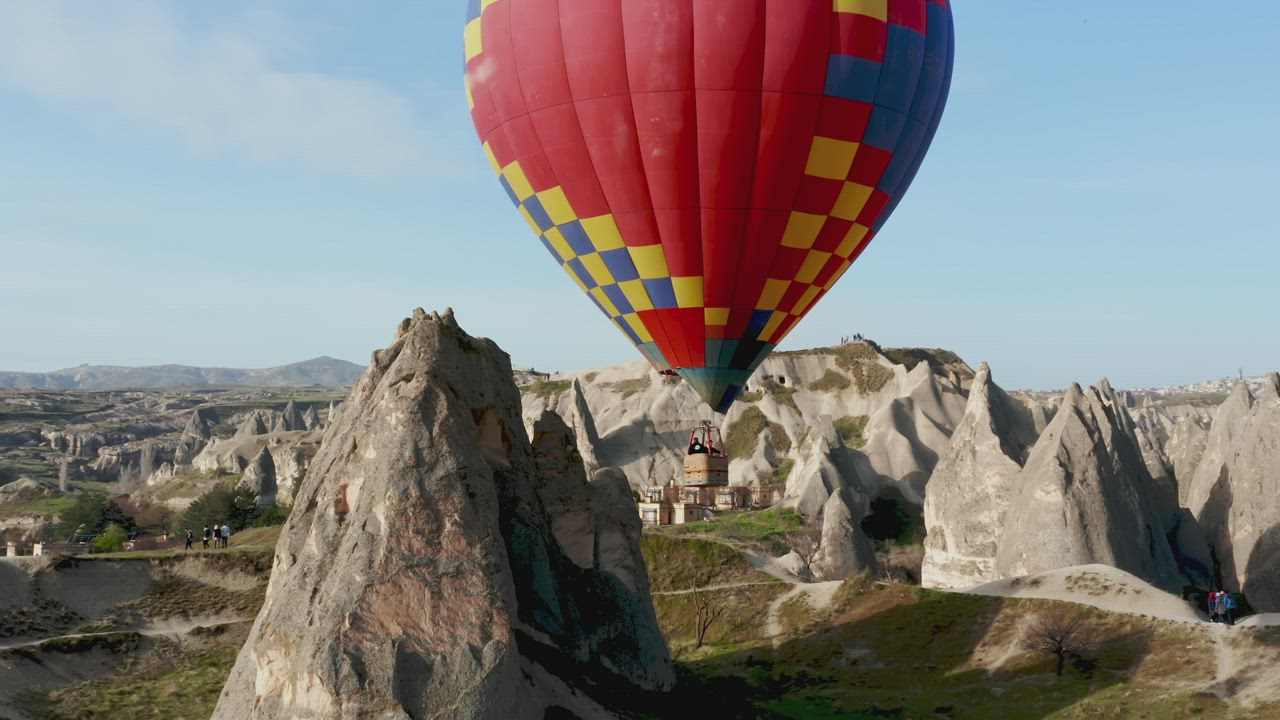 Aerial view of a hot air balloon flying - Free Stock Video