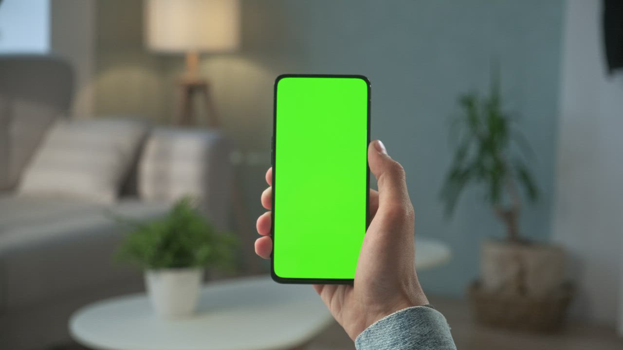 Vertical cellphone with a chroma key screen - Free Stock Video