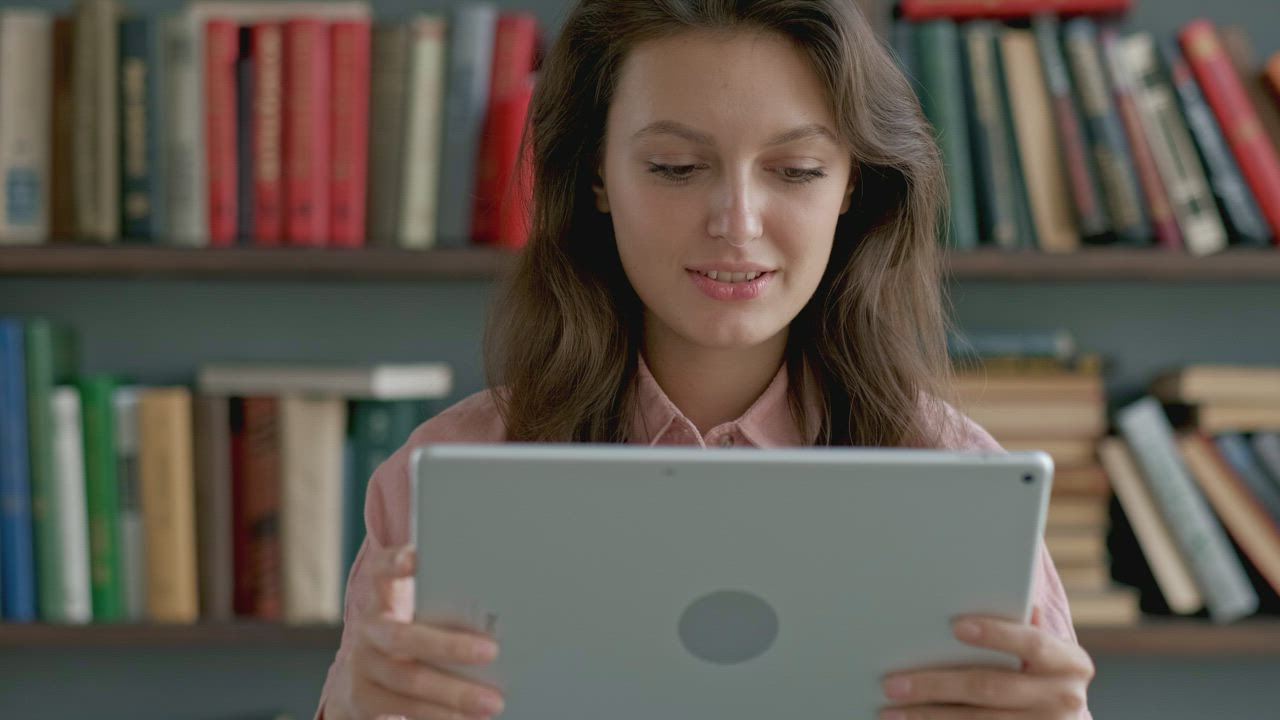 Academic studying with a tablet at the university library - Free Stock ...