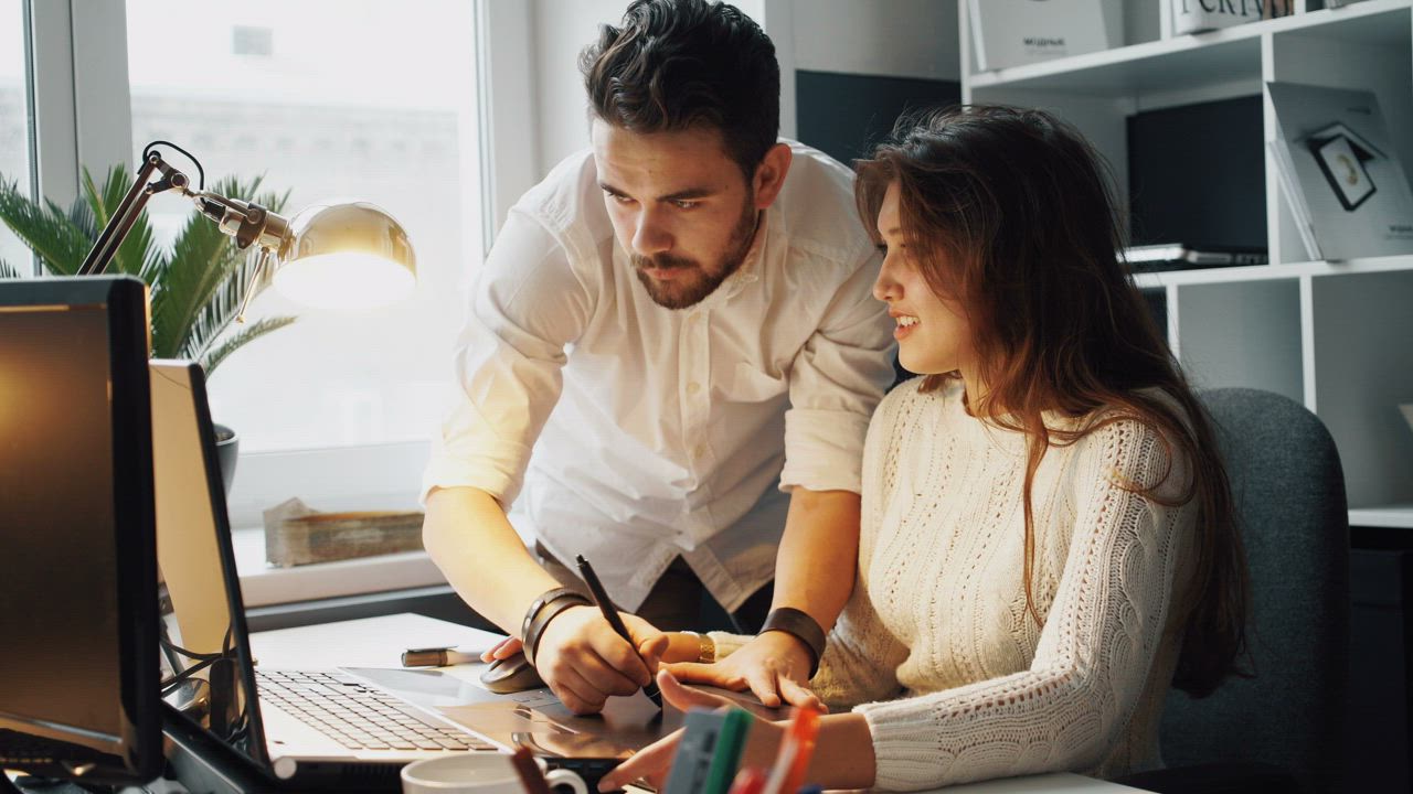 Graphic designers working together - Free Stock Video