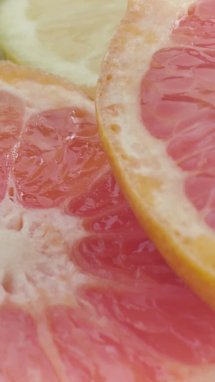 Texture of fresh grapefruit slices - Free Stock Video