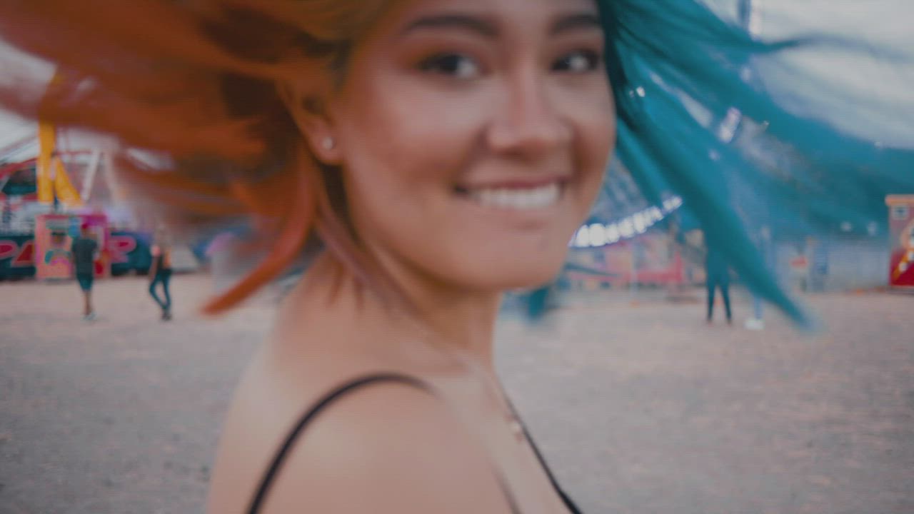 Young woman smiling at the fair - Free Stock Video