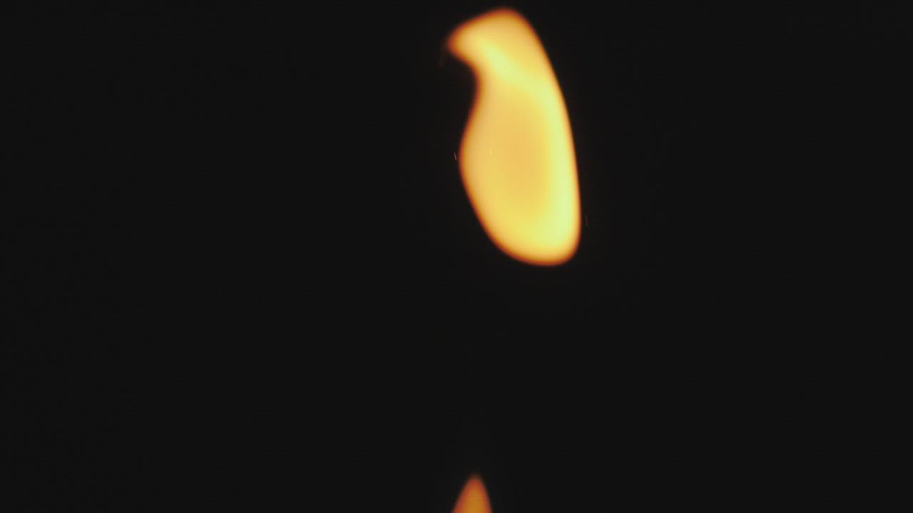 Loop of a flame giving off fire - Free Stock Video