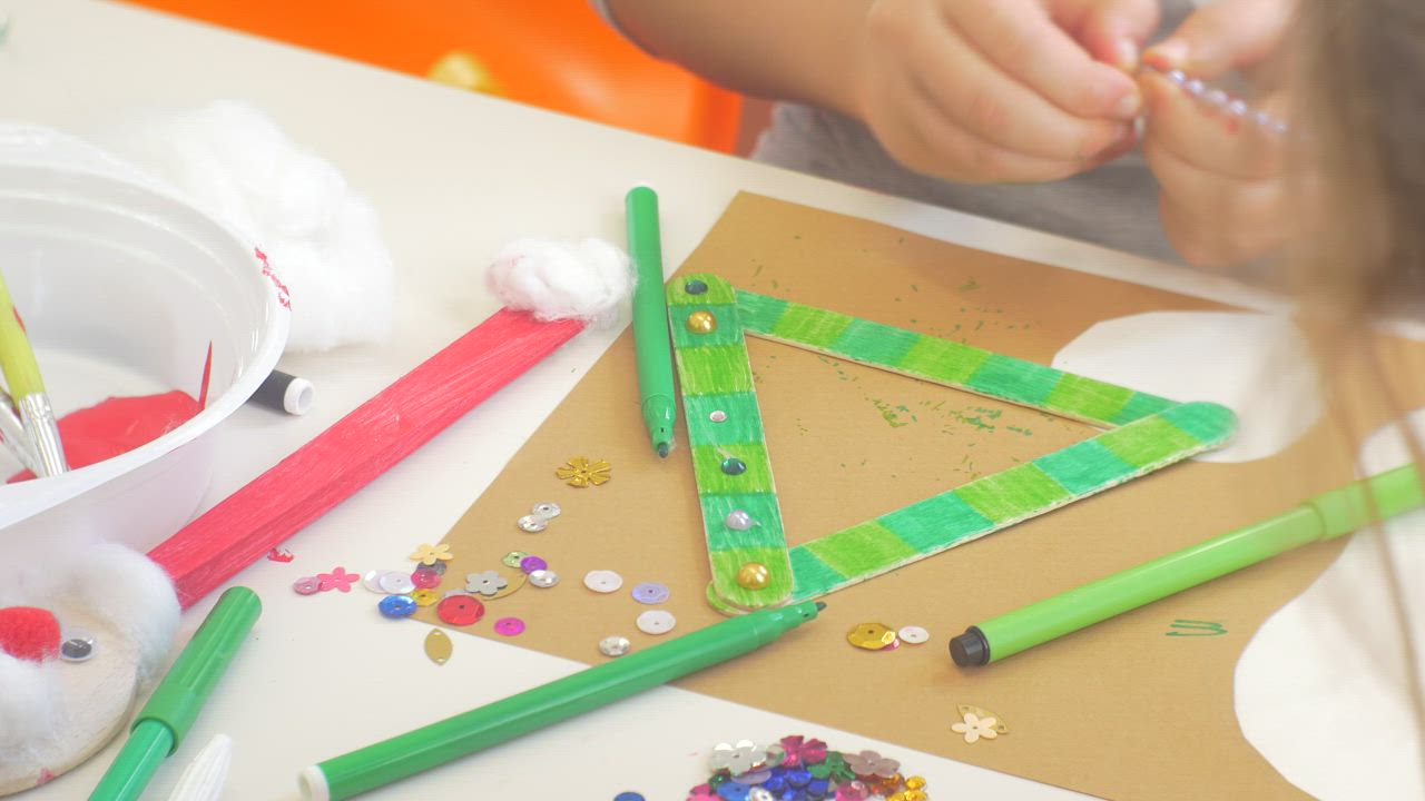 Hands of a girl doing crafts - Free Stock Video