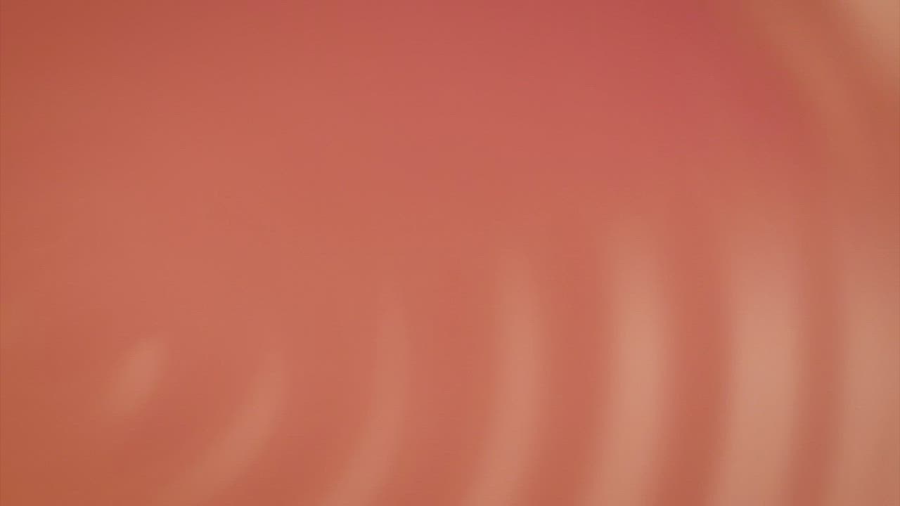 Ripples in pink water, close up - Free Stock Video