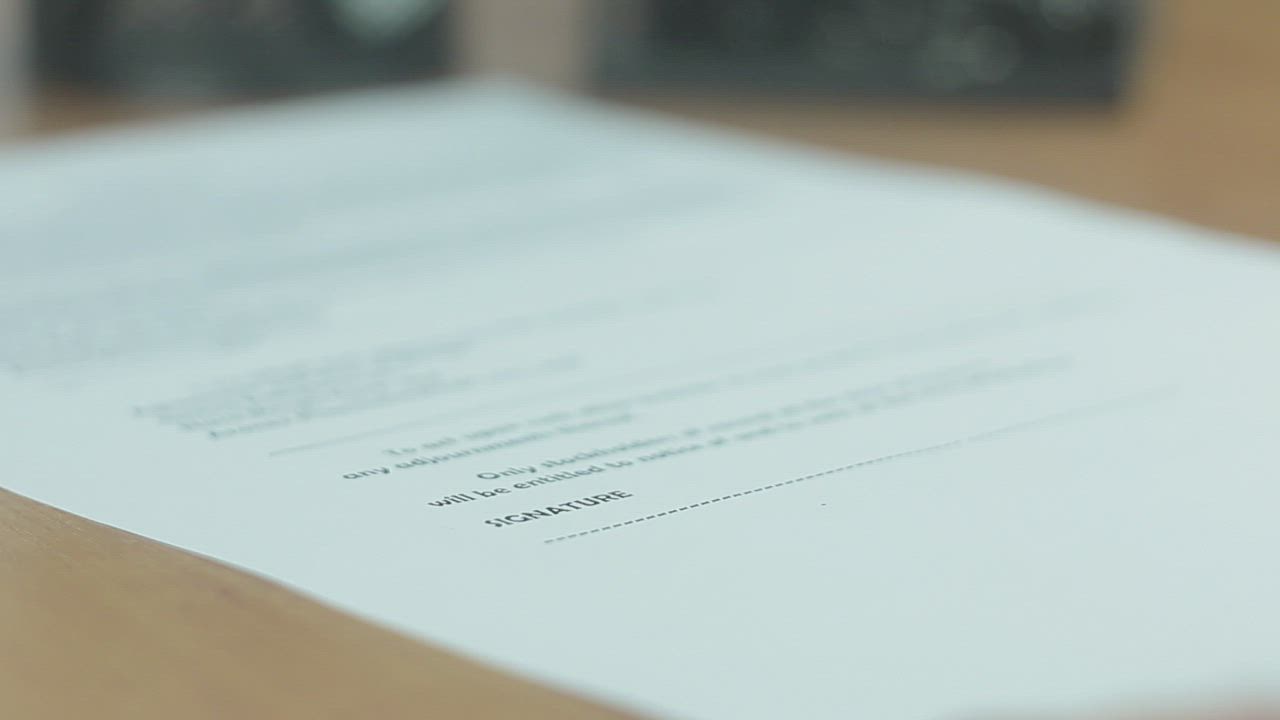 Signing an important document - Free Stock Video