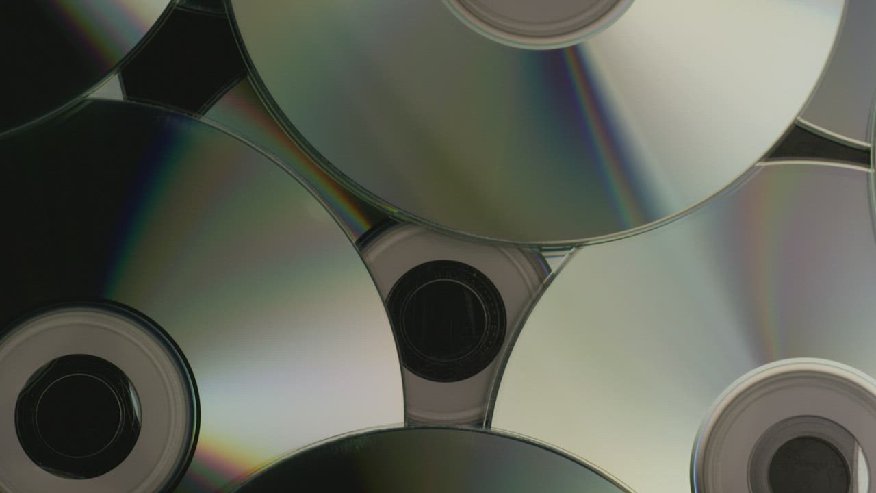 Compact discs spinning slowly - Free Stock Video