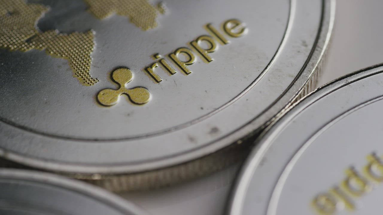 Ripple Bitcoin coins in a close shot - Free Stock Video