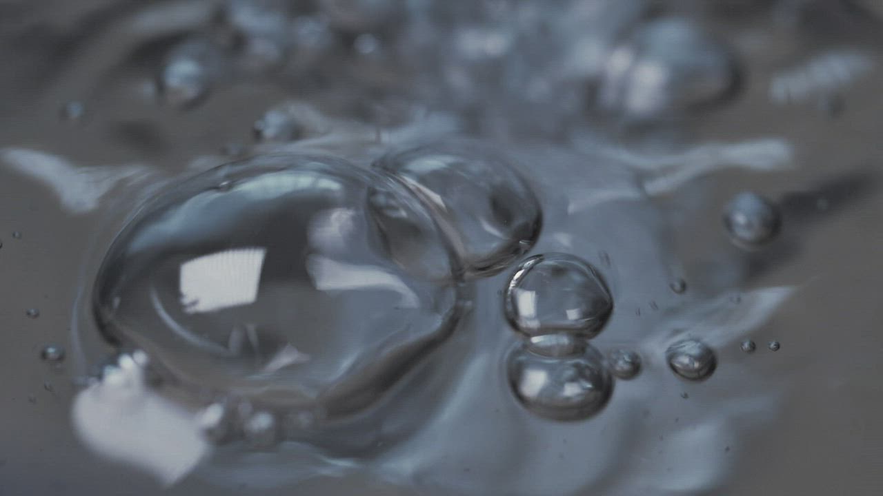 Water falling in detail view - Free Stock Video