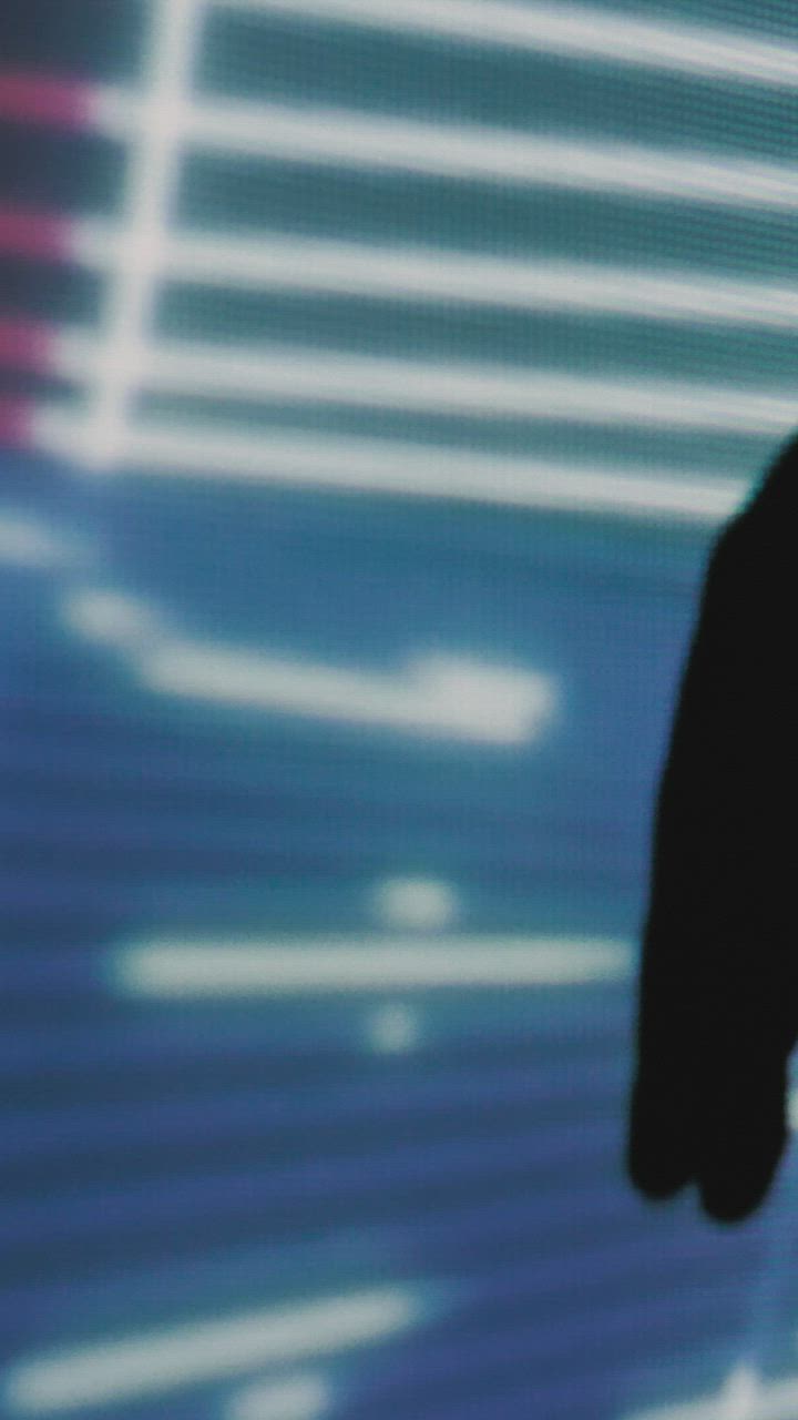 Shadow of a person's hand waving - Free Stock Video