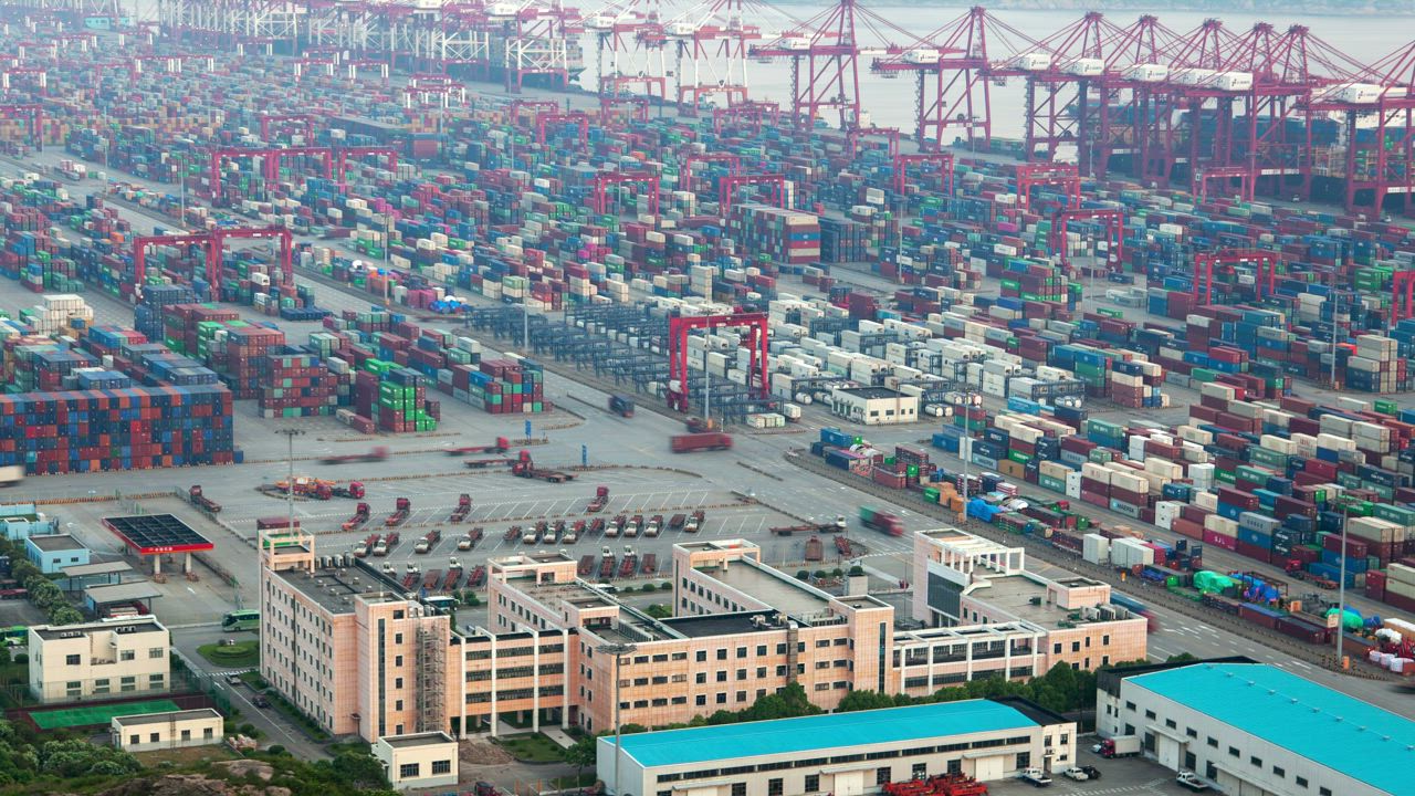 Large warehouse area on a shoreline of ships in a high shot - Free ...
